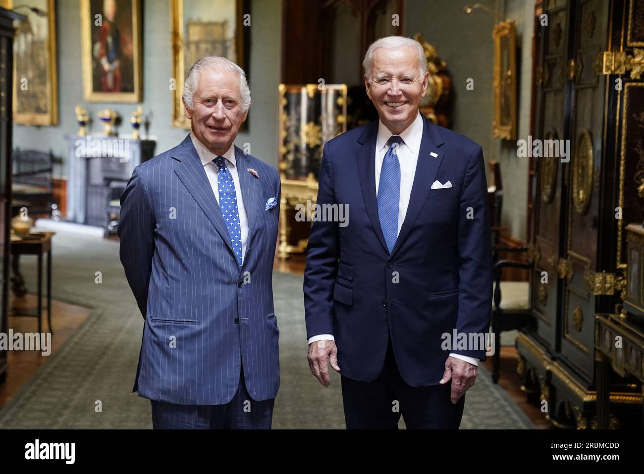 King Charles III and US President Joe Biden in the Grand Corridor at Windsor Castle, Berkshire ...