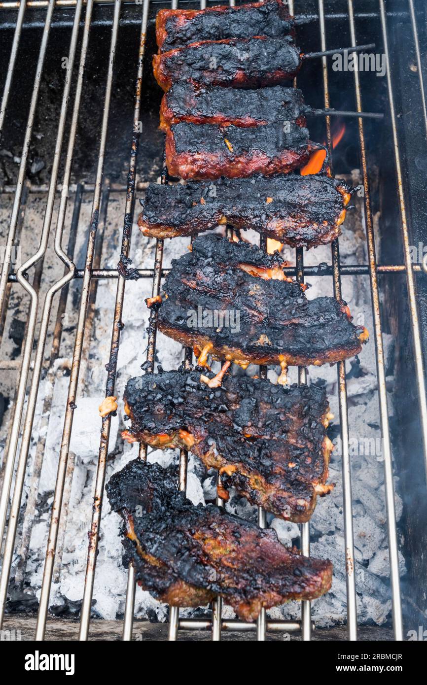 Meat cooking on a barbecue Stock Photo - Alamy