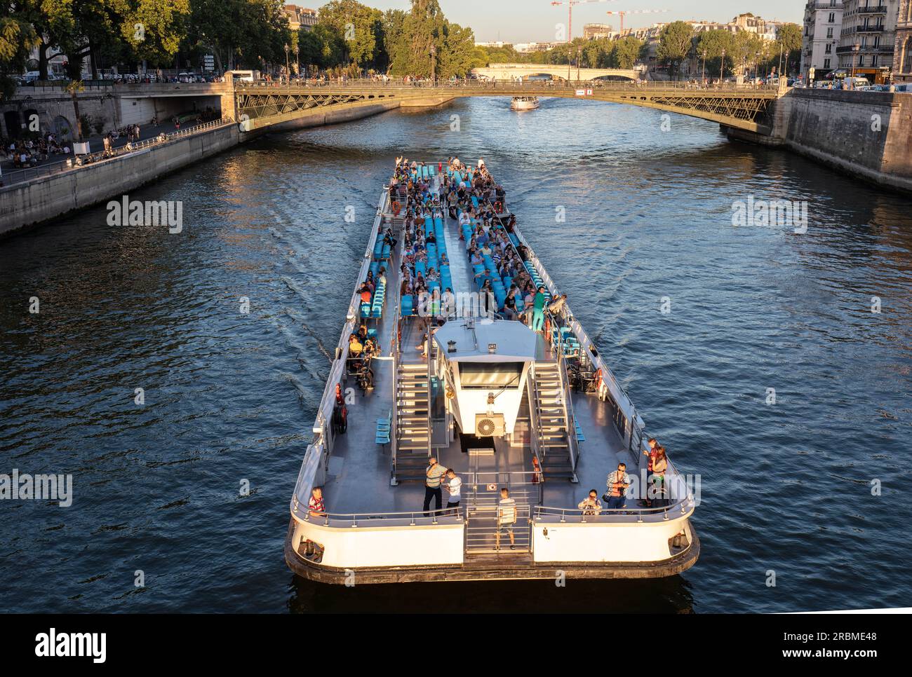 Romantic Paris. Bateaux Mouches river cruise boats on River Seine near ...