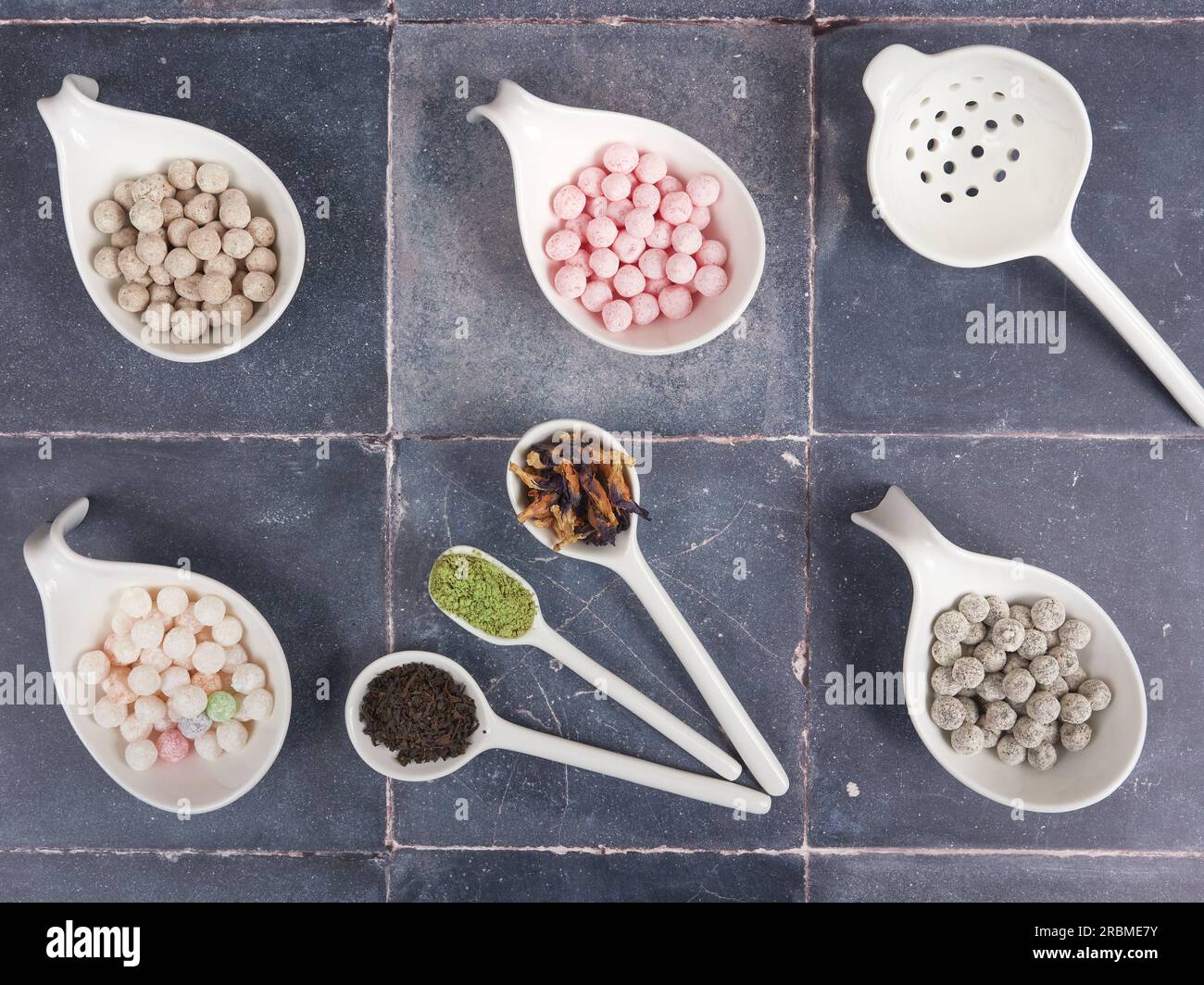 Raw, uncooked tapioca balls with different flavors, also known as boba ...