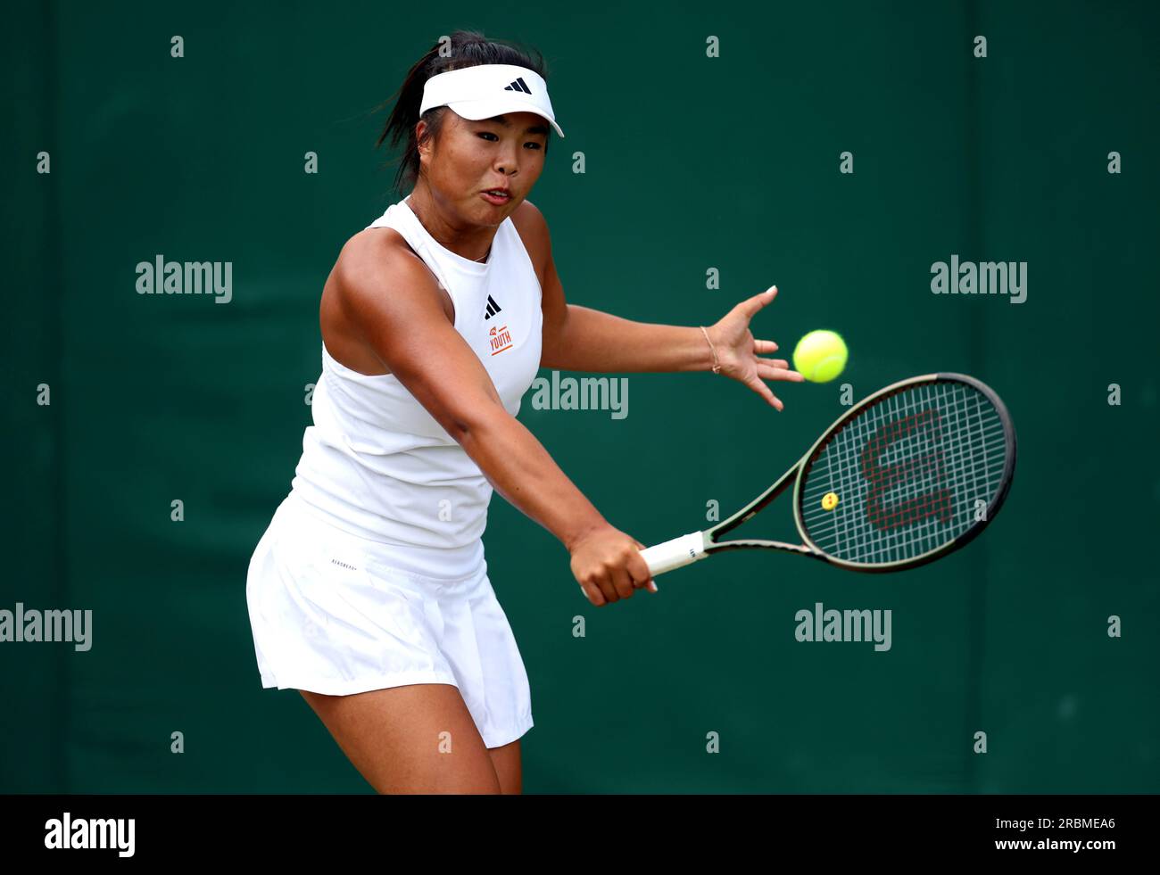 Mingge Xu in action during her girls singles match on day eight of the ...