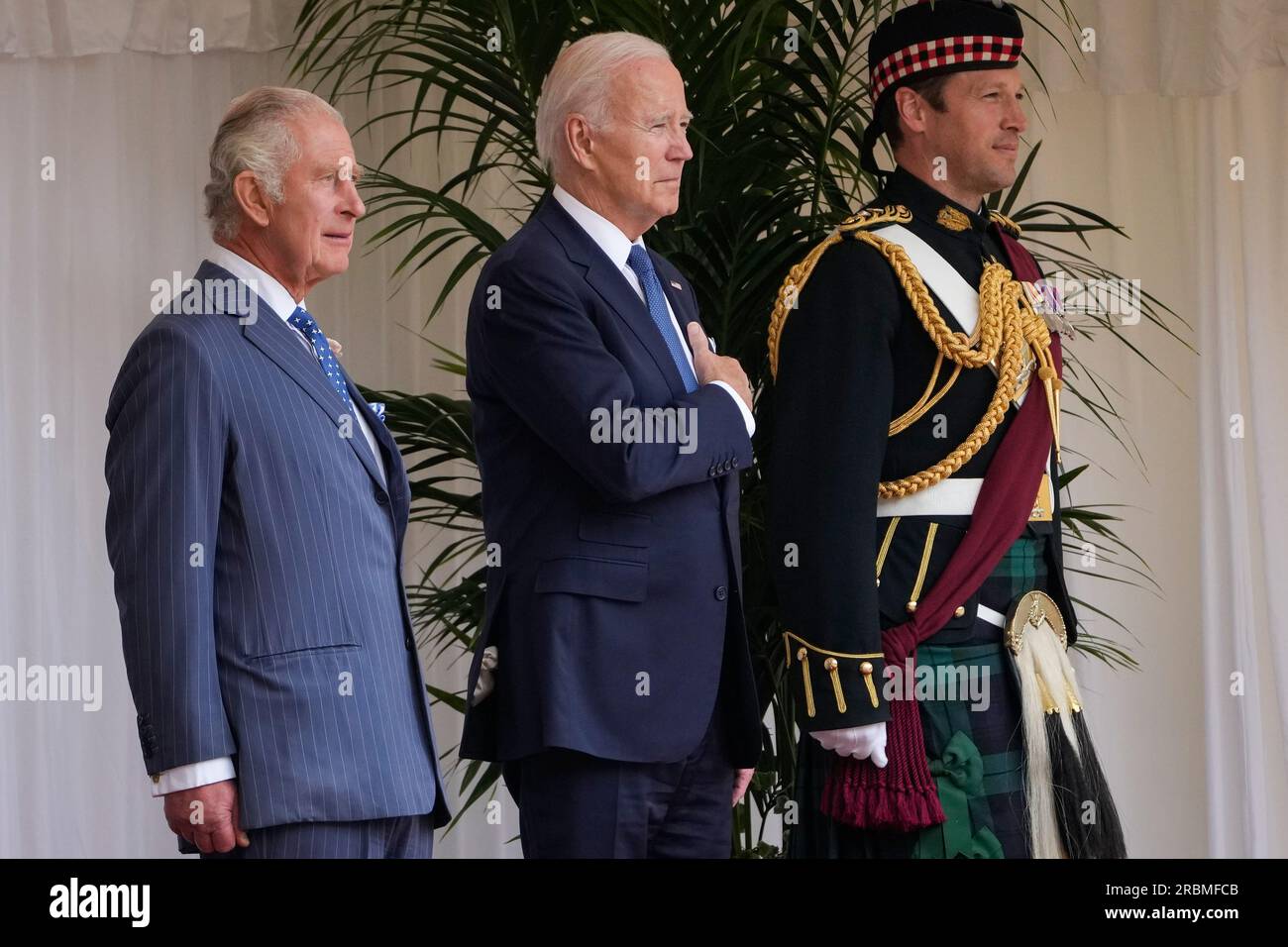 US President Joe Biden and Britain's King Charles III listen to the US ...