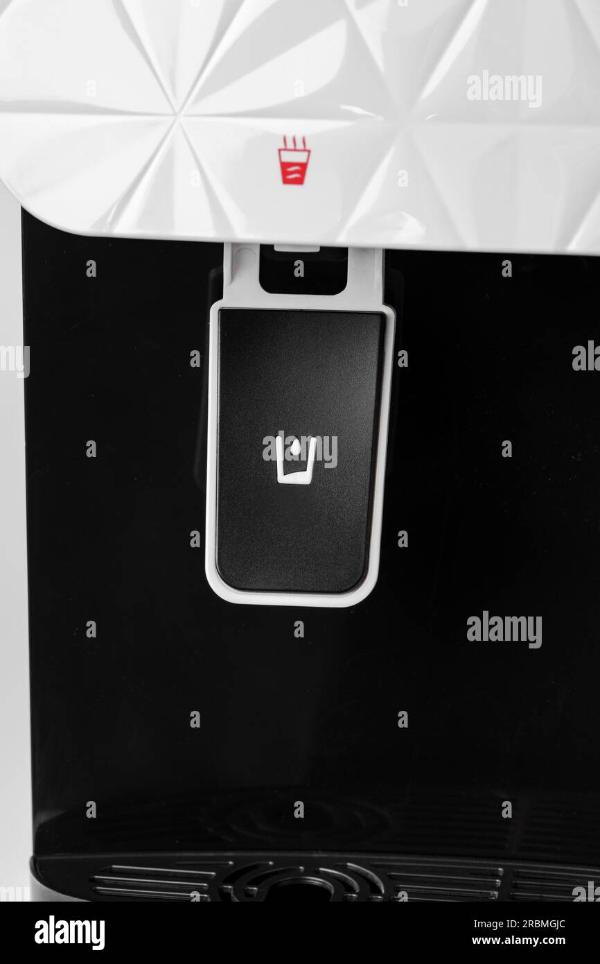 Water button in the cooler close up Stock Photo - Alamy