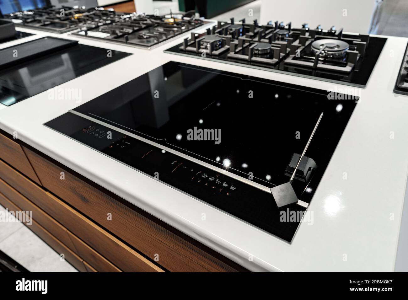 Modern cooking stoves on display in the store Stock Photo - Alamy
