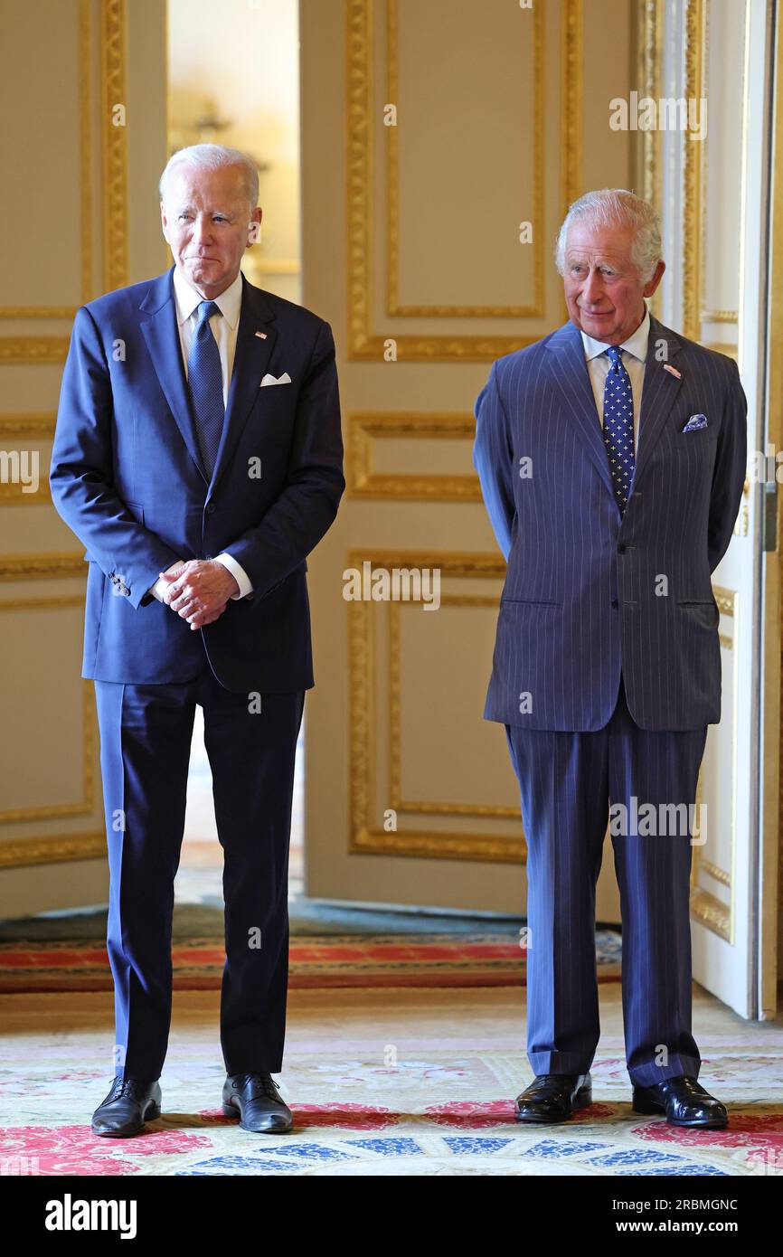 King Charles III and US President Joe Biden in the Green Drawing Room at Windsor Castle ...