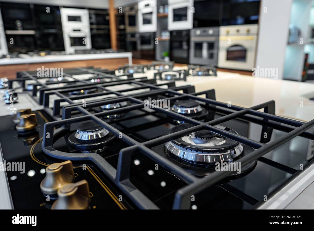 Modern cooking stoves on display in the store Stock Photo - Alamy