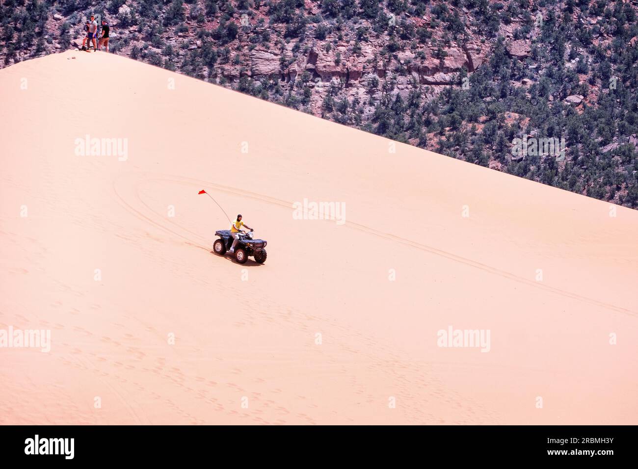 ATV driving on the Coral Pink Sand Dunes Utah USA Stock Photo - Alamy