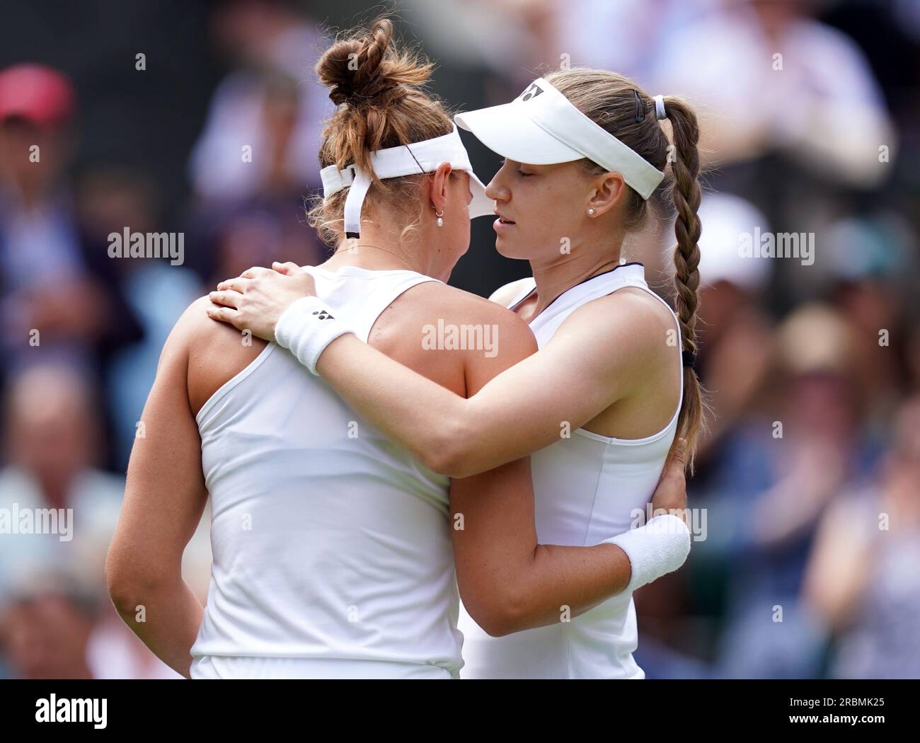 Elena Rybakina (right) consoles Beatriz Haddad Maia as she retires ...