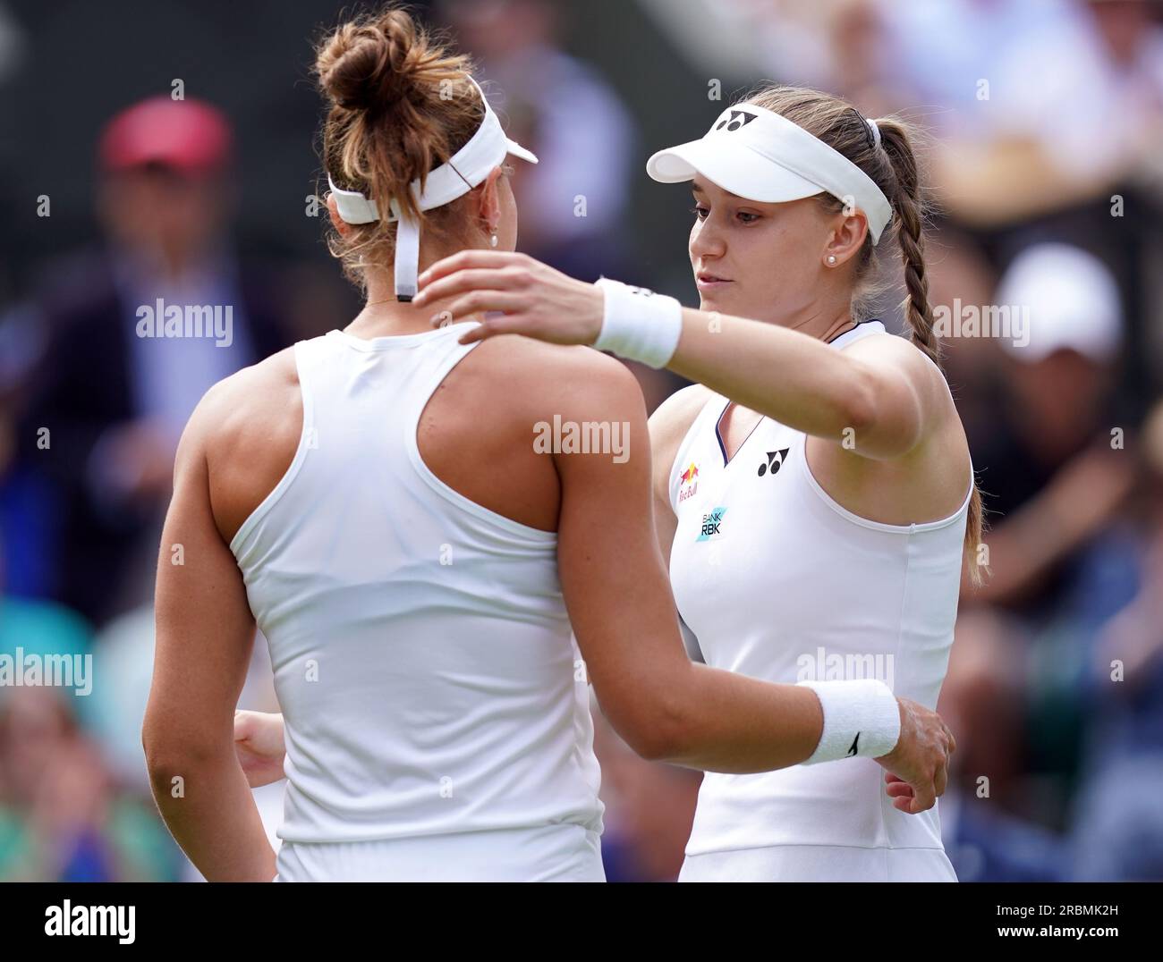 Elena Rybakina (right) consoles Beatriz Haddad Maia as she retires ...
