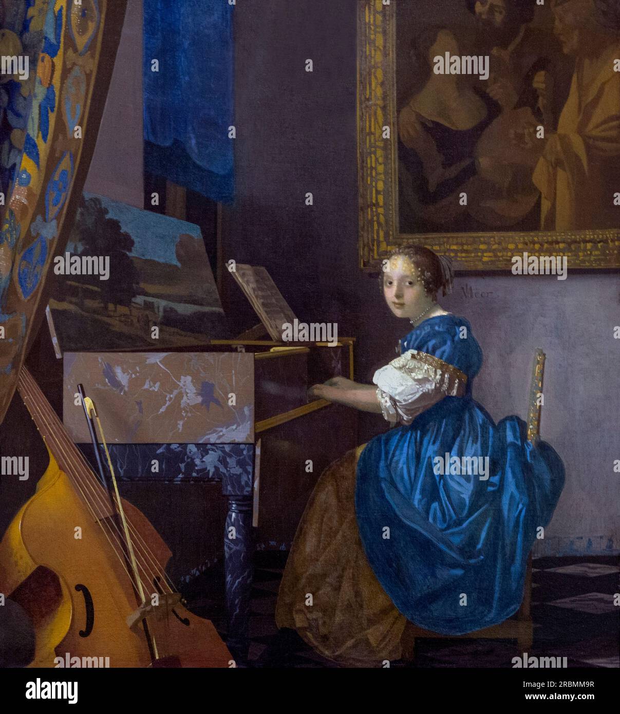 Young woman seated at a Virginal, Johannes Vermeer, circa 1672 Stock ...