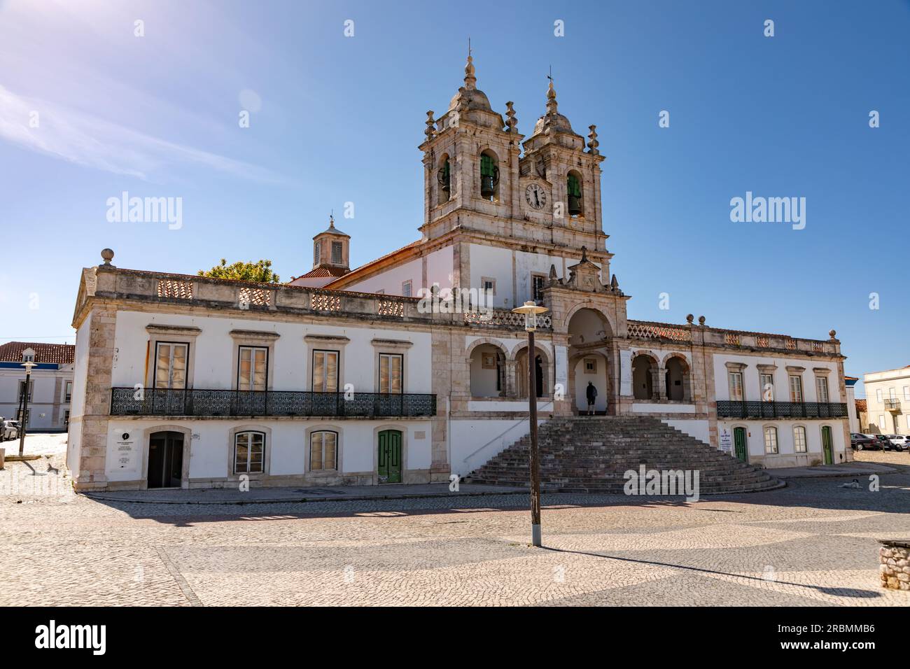The Church of Santuário de Nossa Senhora da Nazaré on the hill above ...