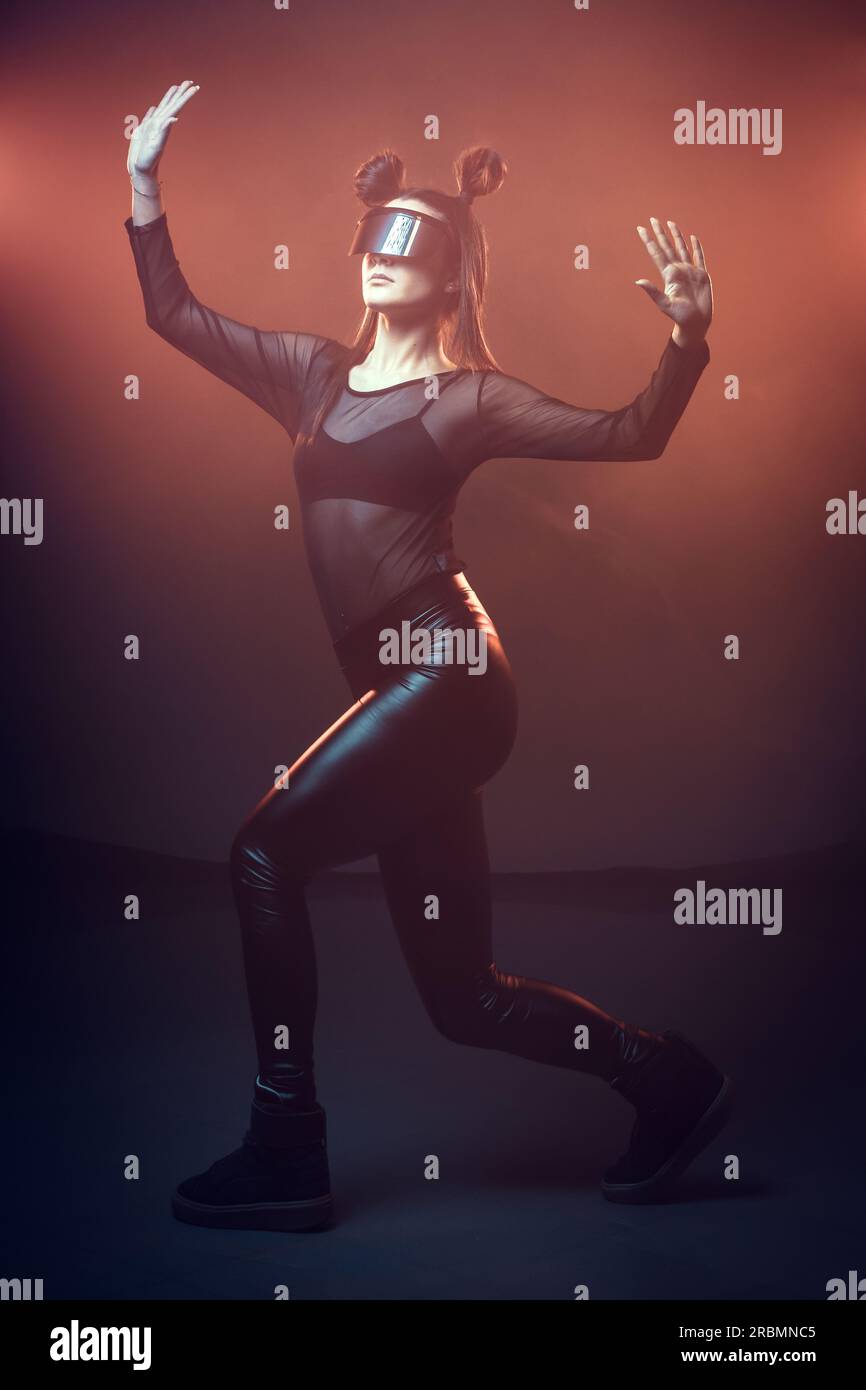 Portrait of beautiful cyber model woman posing wearing futuristic ...