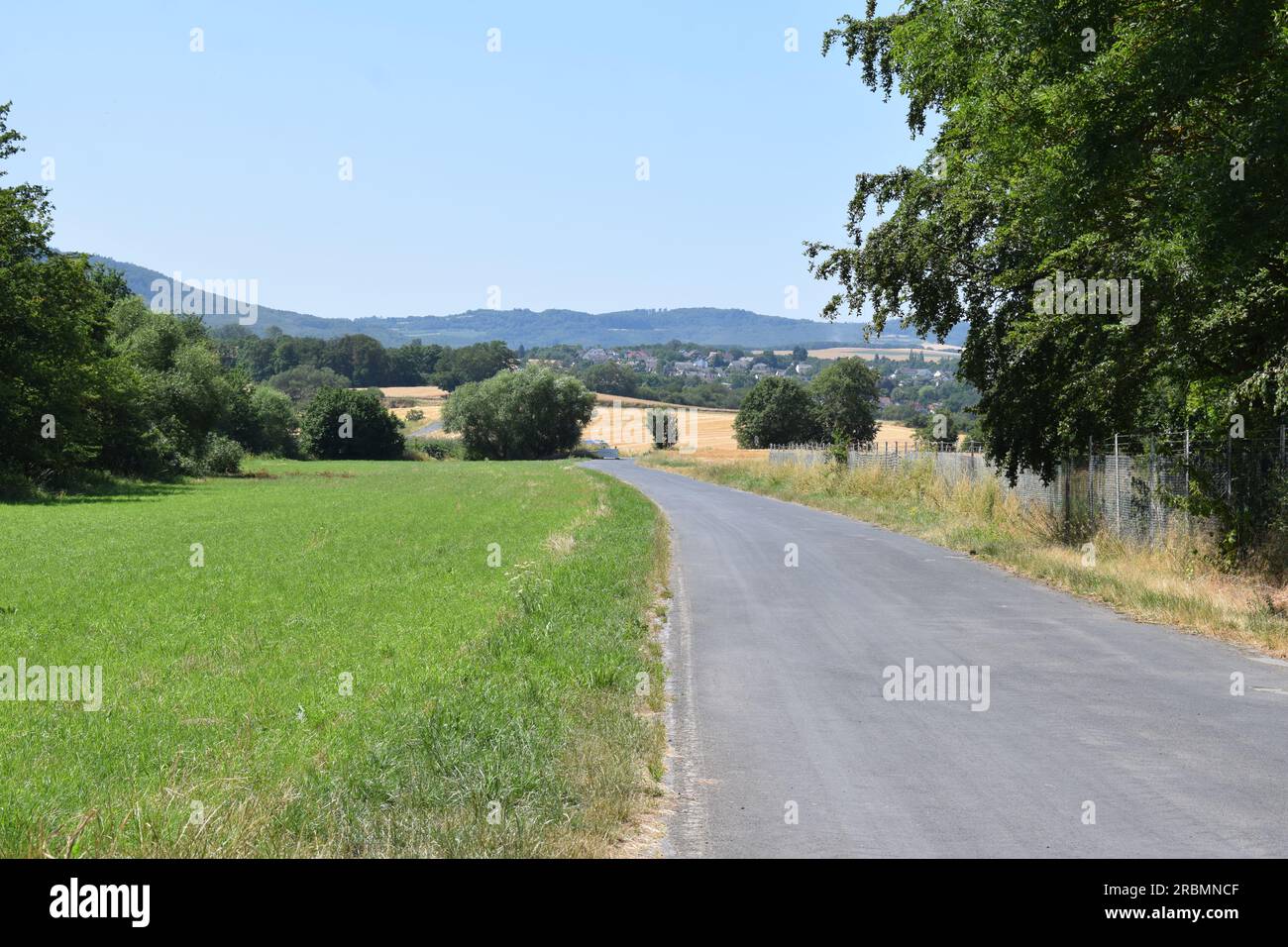 tiny country road in summer Stock Photo - Alamy