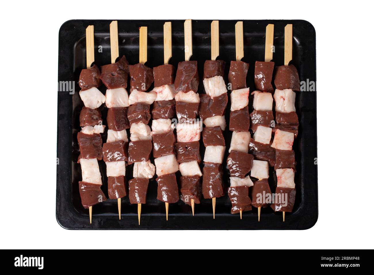 Liver skewer. Raw liver shish kebab isolated on white background ...