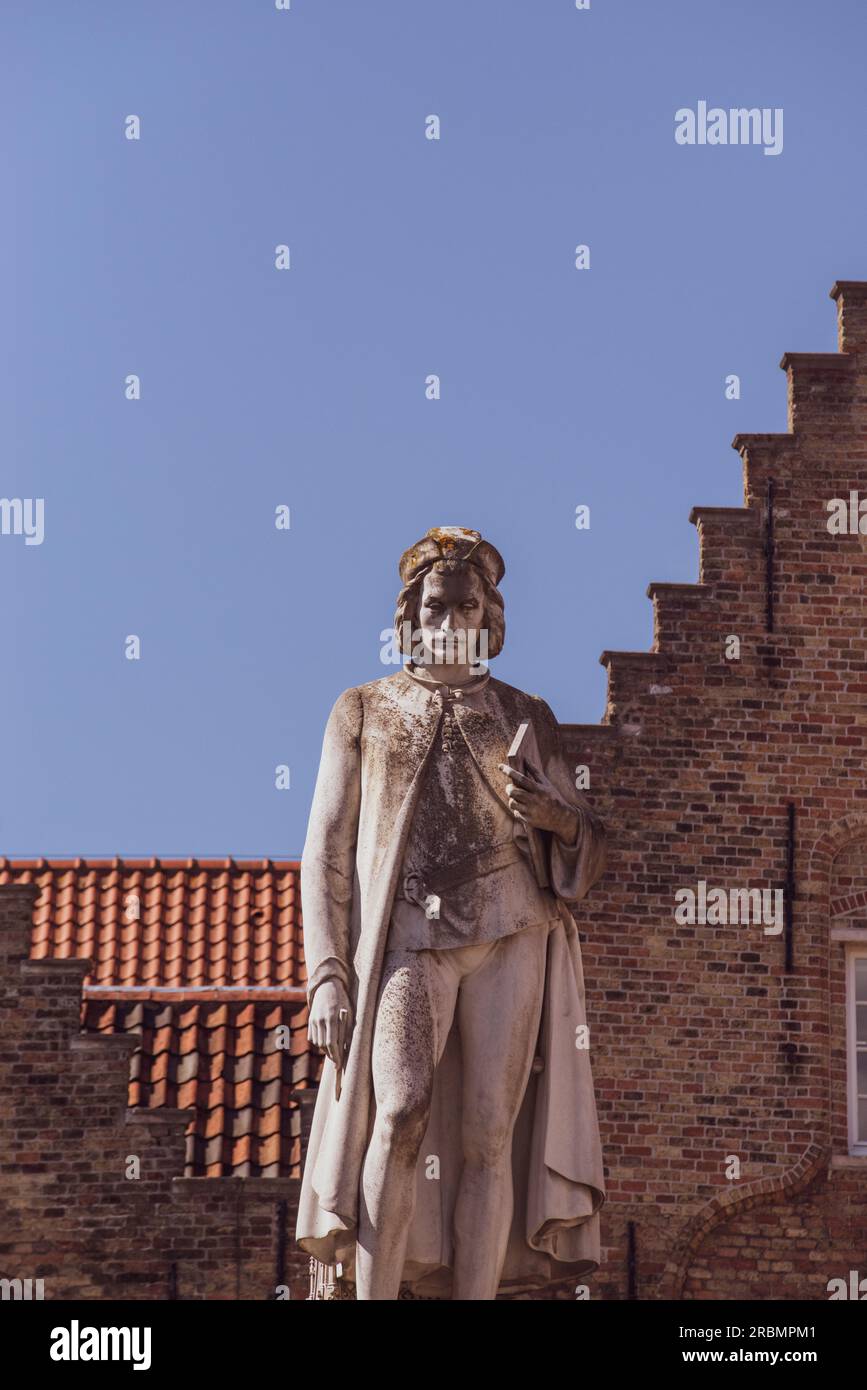 Statue of a medieval merchant from Bruges, Belgium Stock Photo - Alamy
