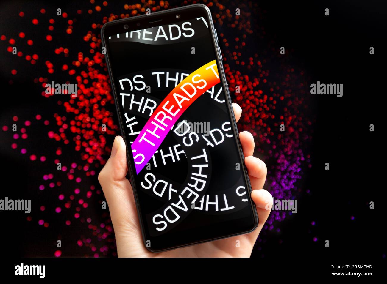 Ukraine, Odesa - July, 7 2023: Hand holding mobile with Threads app ...