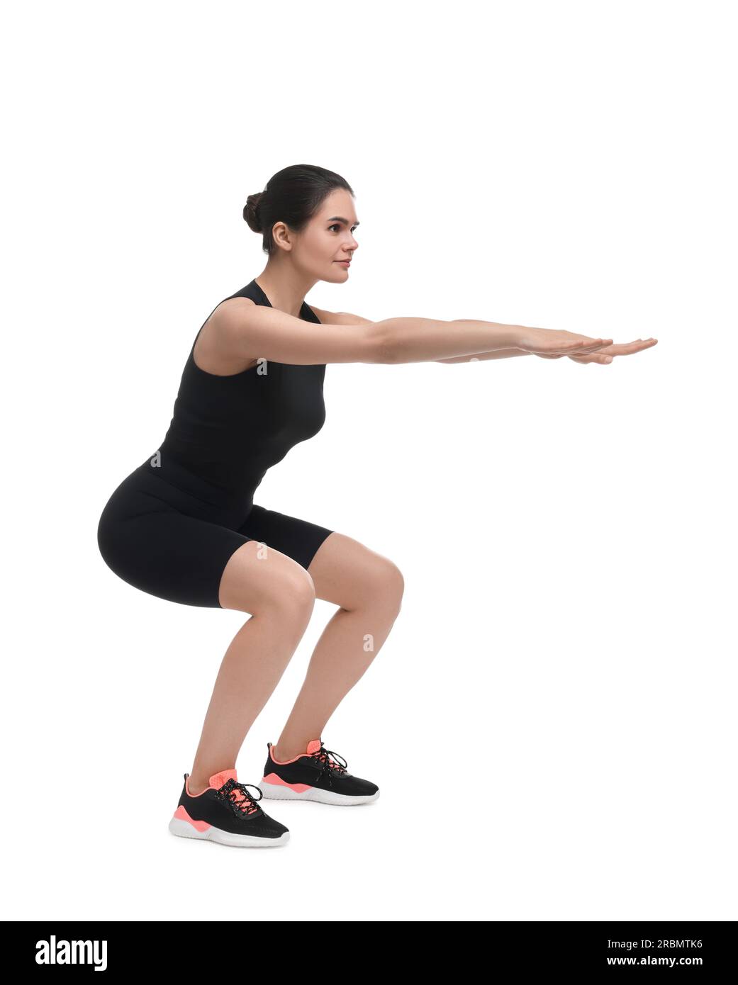 Woman doing squats on white background. Morning exercise Stock Photo ...
