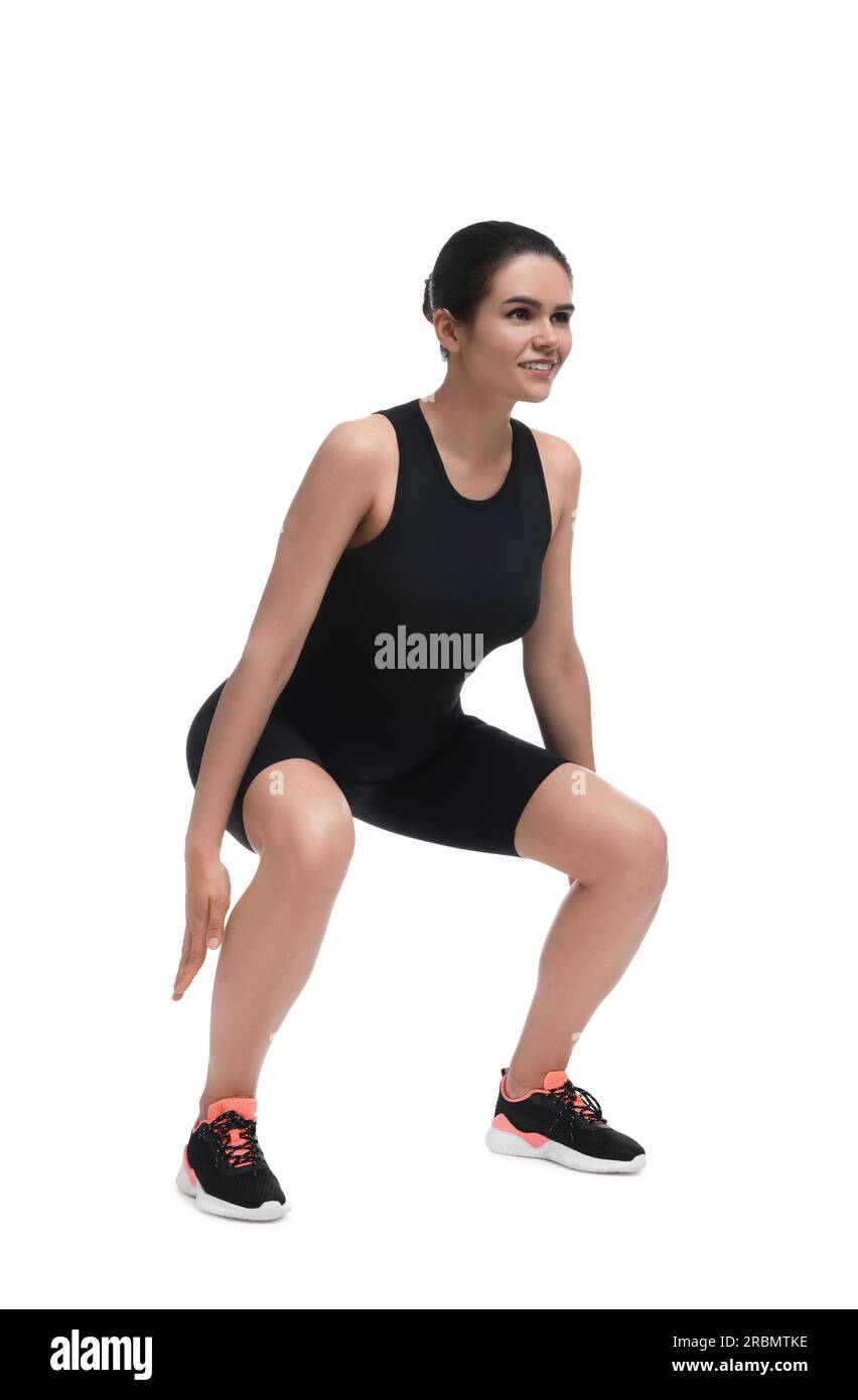 Woman squat exercise white background hi-res stock photography and ...