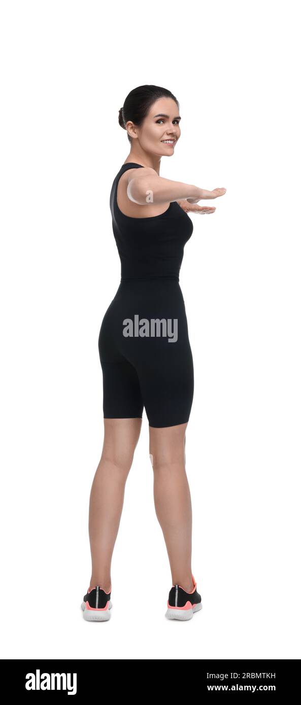 Happy woman doing morning exercise on white background Stock Photo - Alamy
