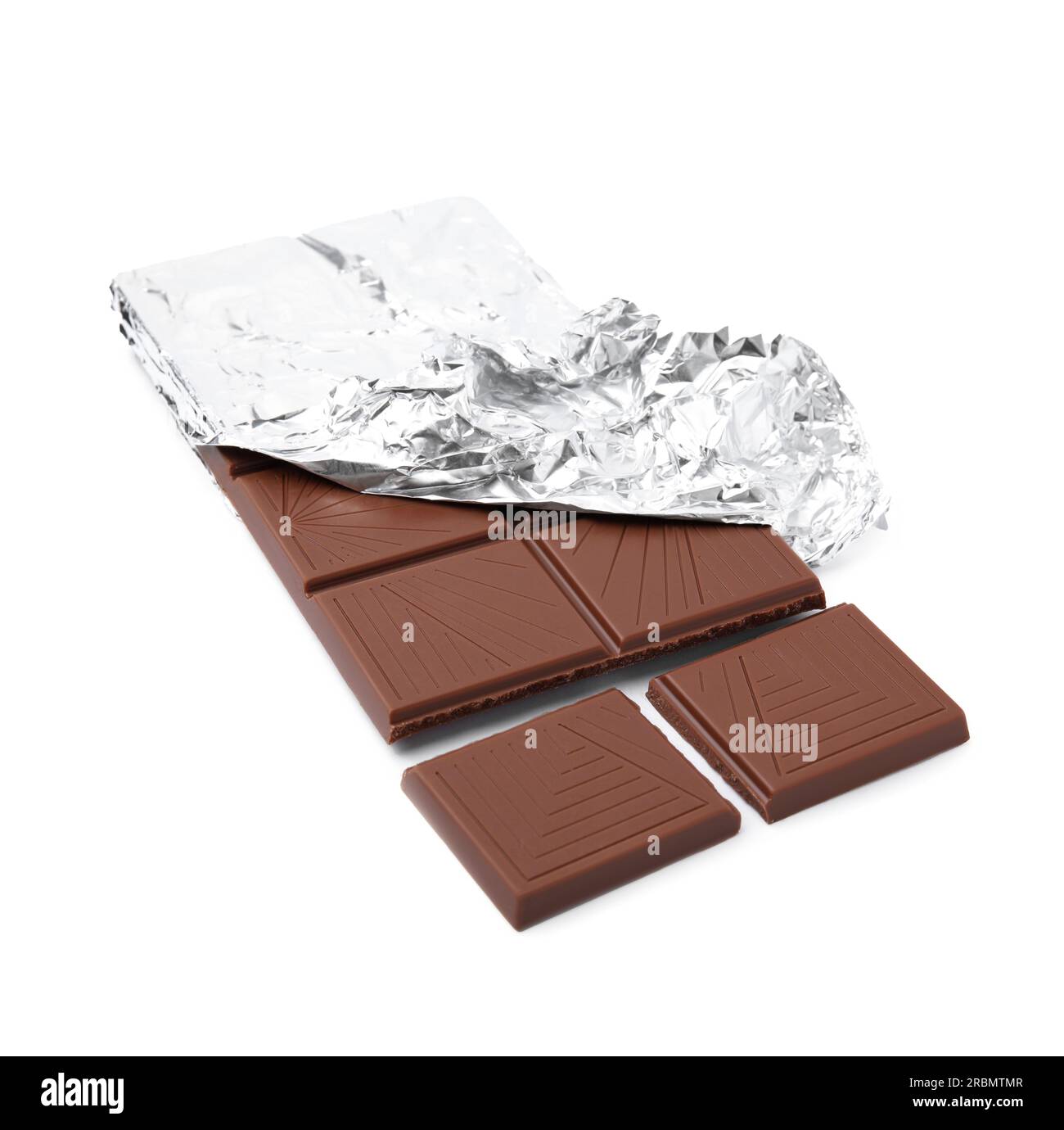 Broken milk chocolate bar wrapped in foil isolated on white Stock Photo ...