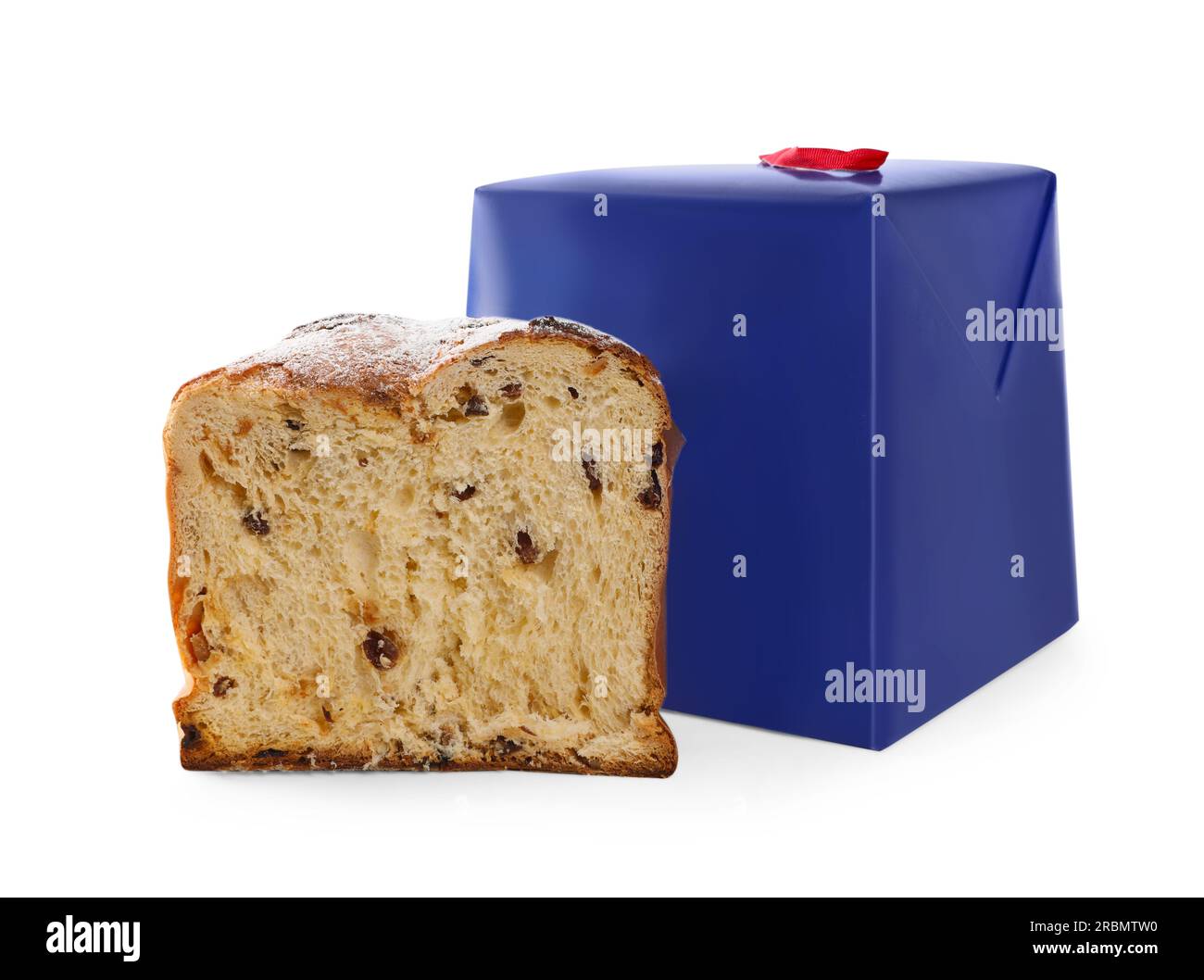 Half of delicious Panettone cake with powdered sugar and box on white ...