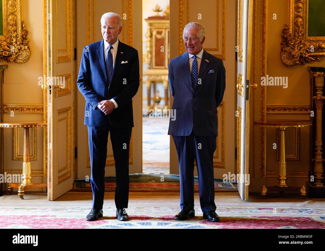 King Charles III and US President Joe Biden arrive to meet participants of the Climate Finance ...