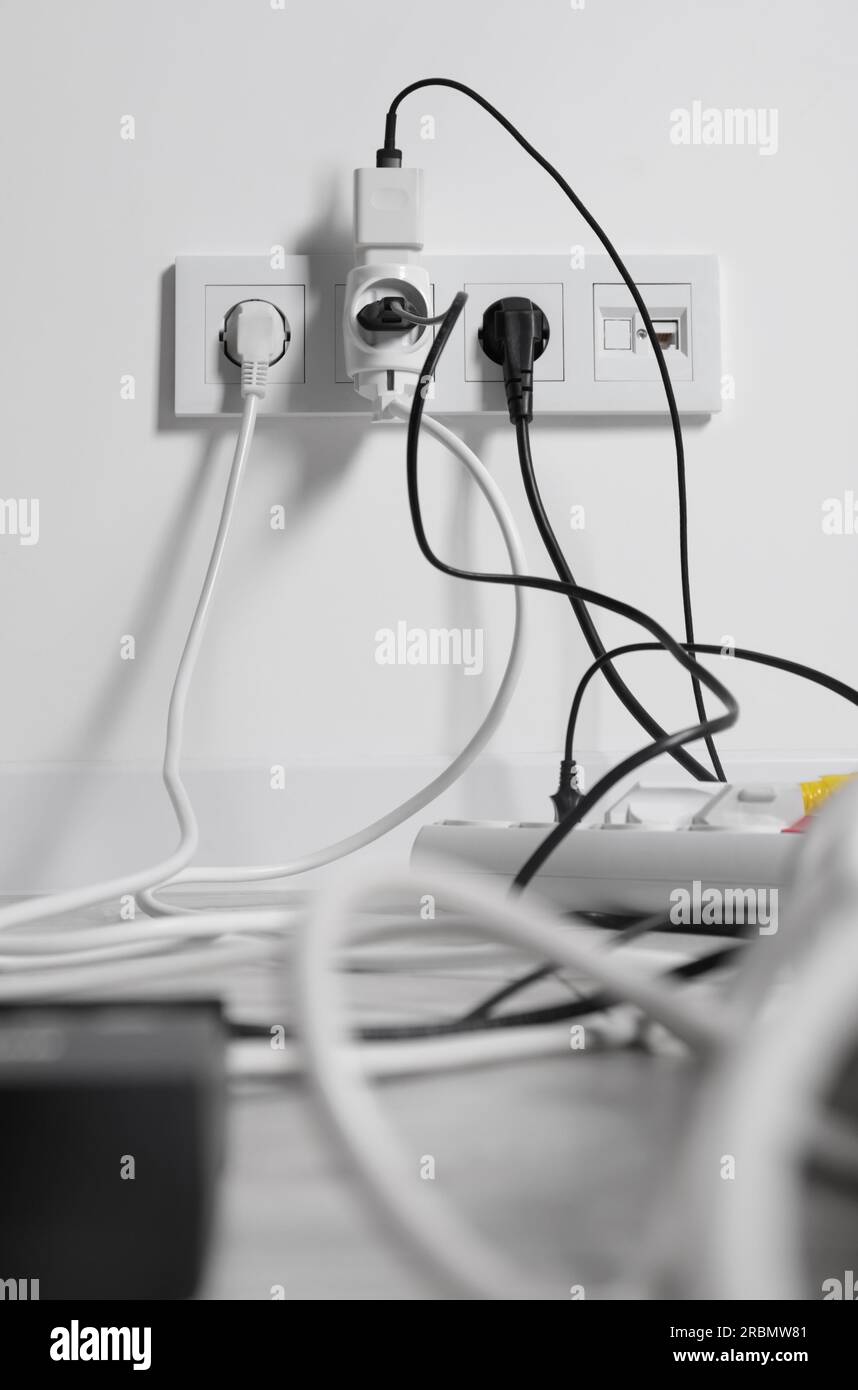 Multiple electrical plugs in wall hi-res stock photography and images ...