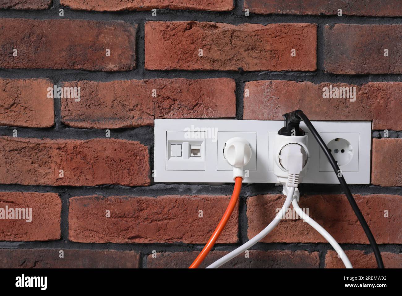 Multiple electrical plugs in wall hi-res stock photography and images ...