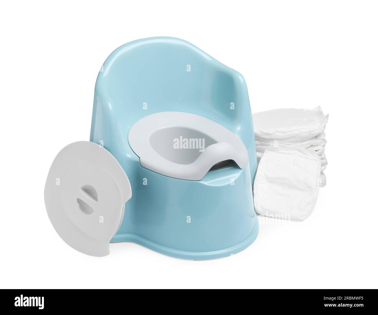 Light blue baby potty and stack of diapers isolated on white. Toilet ...
