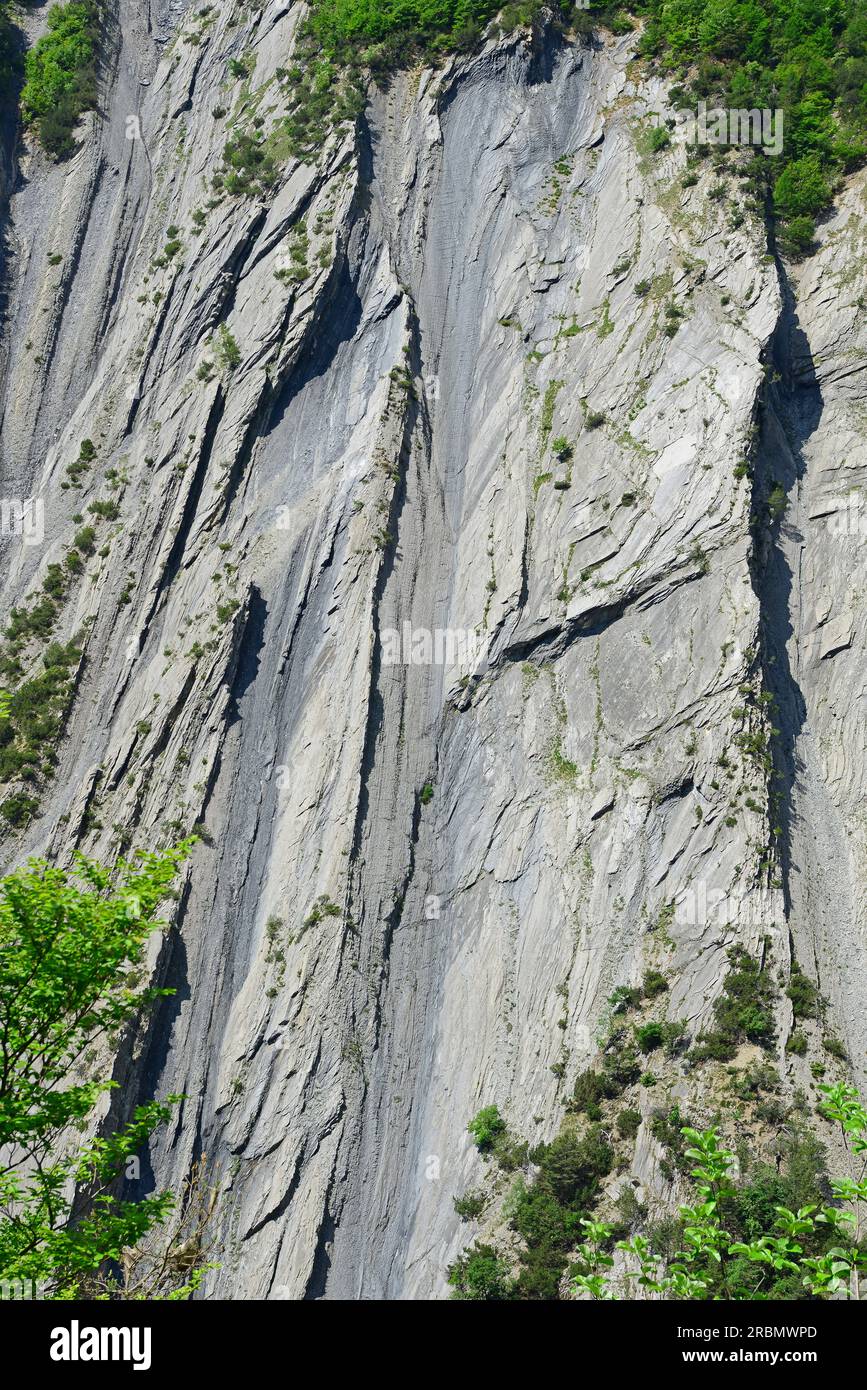 A near vertical, very high limestone rockface Stock Photo - Alamy