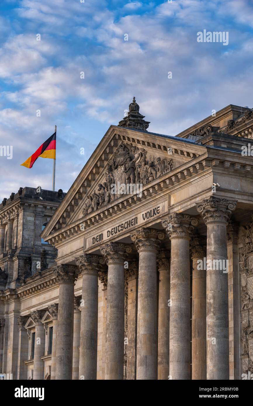 The Reichstag building pediment on Corinthian columns in city of Berlin ...
