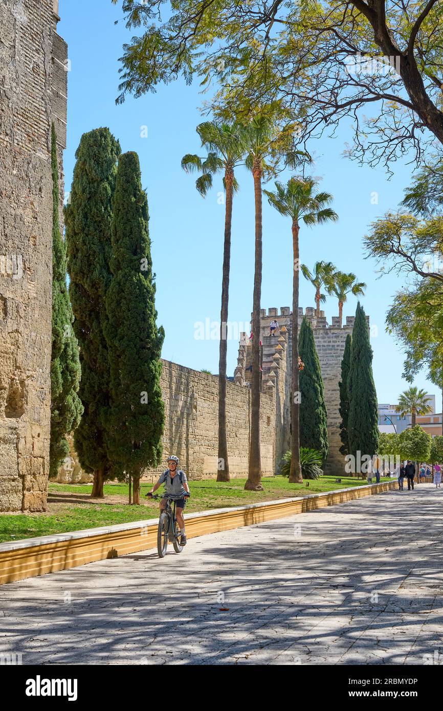 nice, active senior woman cycling with her electric mountain bike in ...