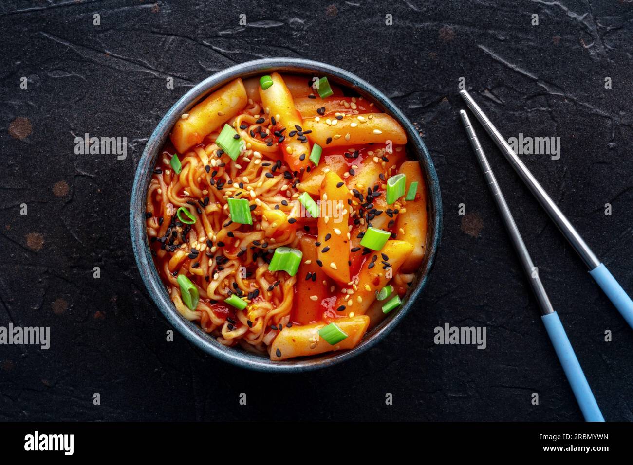 Rabokki, tteokbokki or topokki with ramen, Korean street food, spicy ...