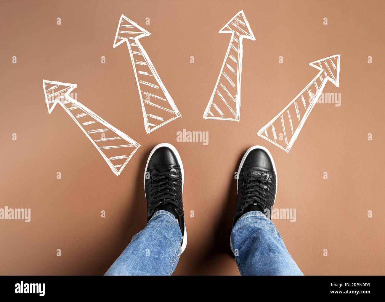 Choosing future profession. Man standing in front of drawn signs on ...