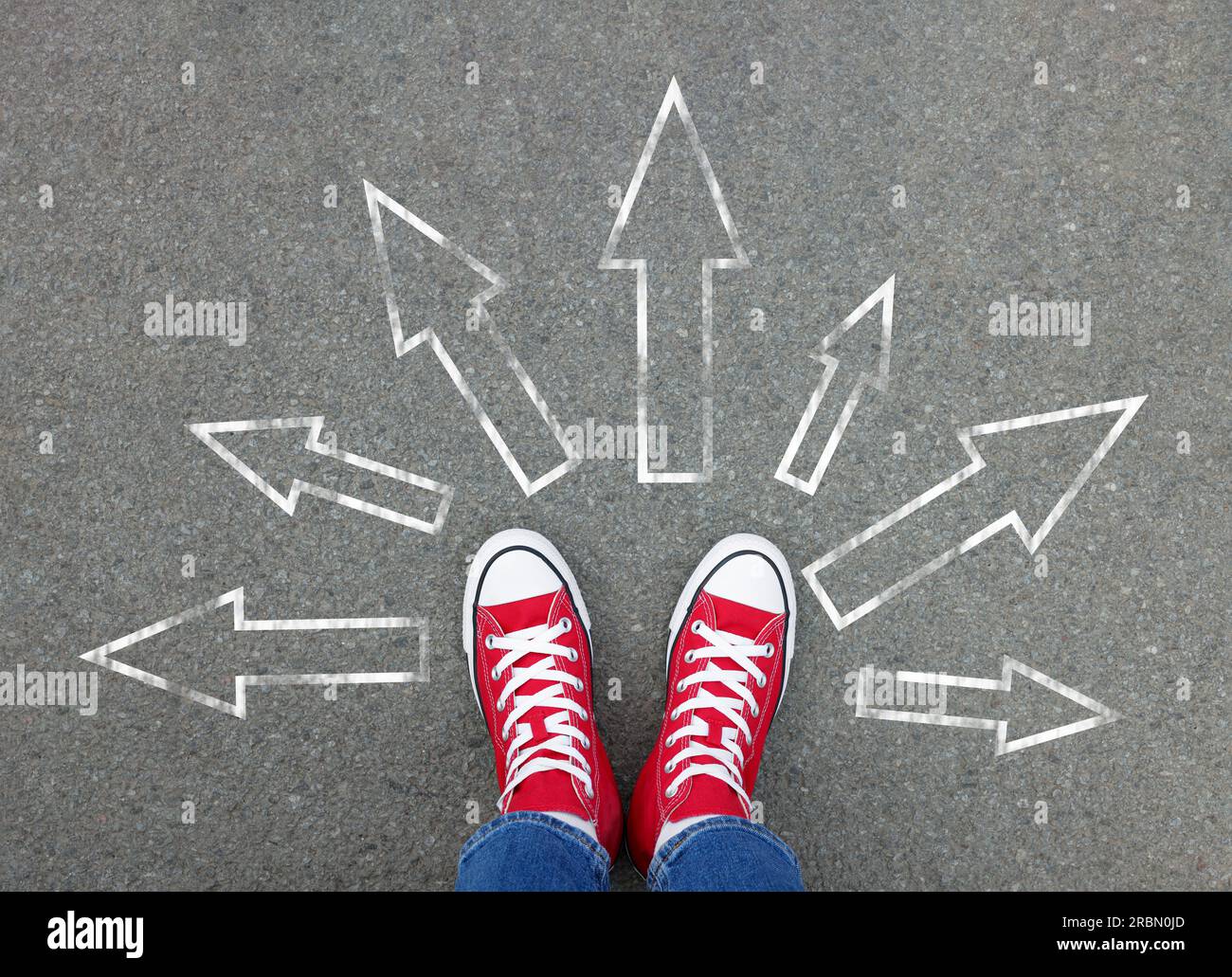 Choosing future profession. Girl standing in front of drawn signs on ...