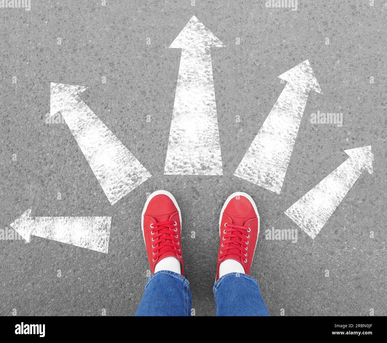 Choosing future profession. Girl standing in front of drawn signs on ...