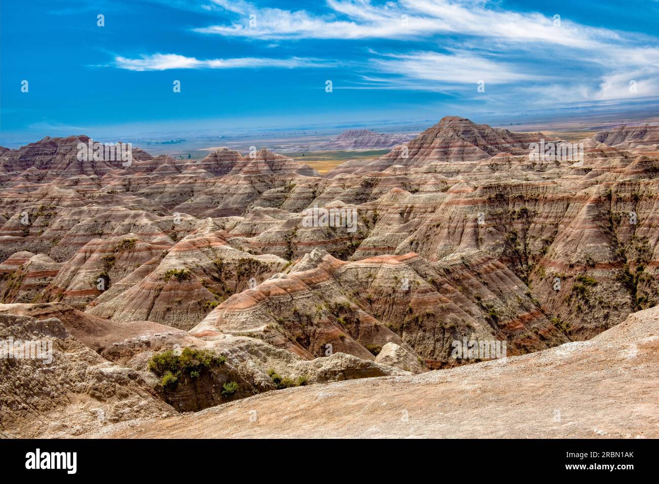 Brilliant Blue Sky and Red Sandstone in Badlands National Park Stock ...
