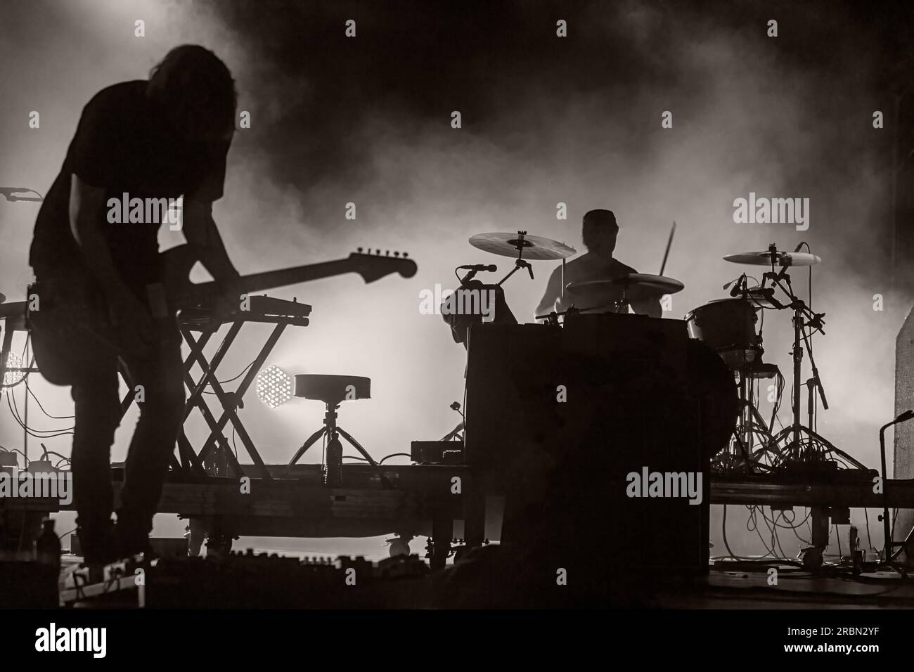 Captivating black and white concert image with the dynamic band, stage ...