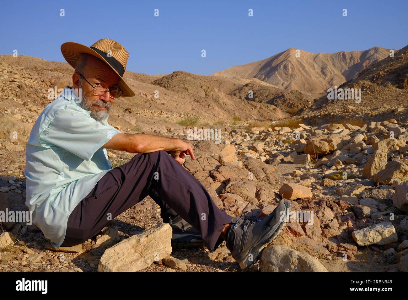 Pile of stones in desert Stock Photo - Alamy