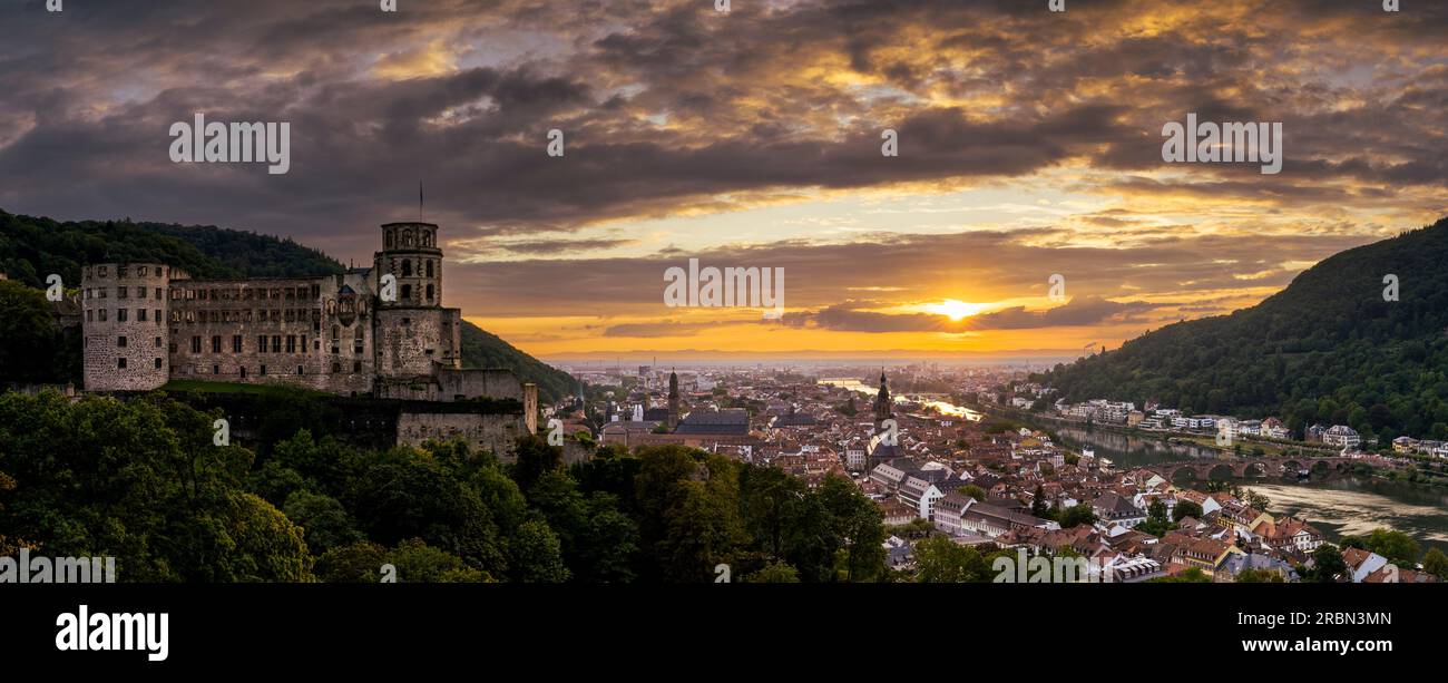 The famous castle of Heidelberg and the Old Town at sunset. Image taken ...