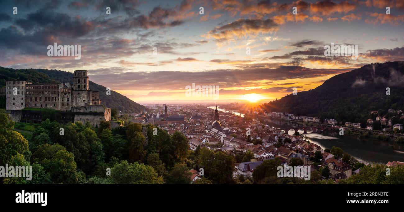 The famous castle of Heidelberg and the Old Town at sunset. Image taken ...