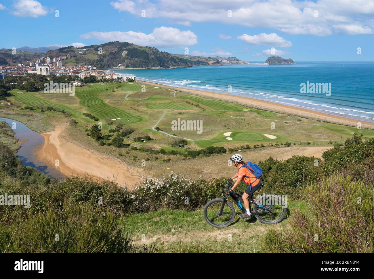 nice senior woman cycling with her electric mountain bike in the hills ...