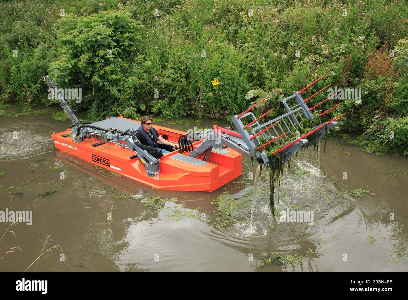 Aquatic Weed boat working on a drain in the Lincolnshire fens Stock ...