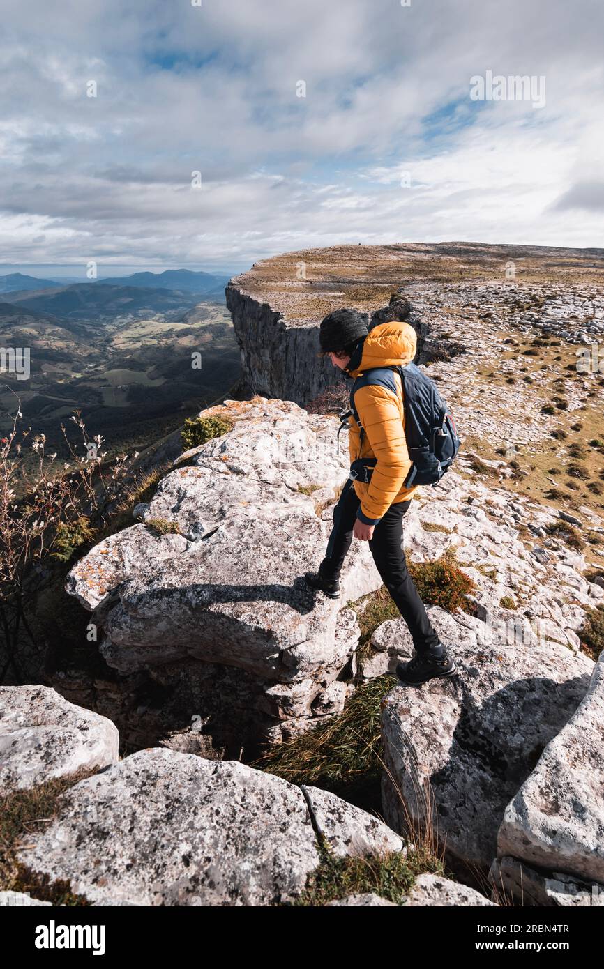 mountaineer having fun on the rocks in the spectacular landscape of the ...