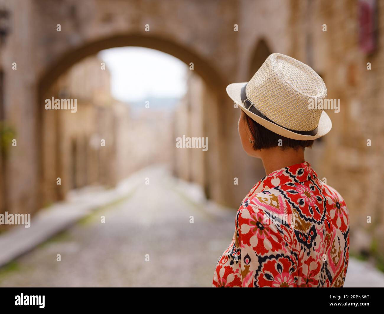 summer trip to Rhodes island, Greece. Young Asian woman in ethnic red ...