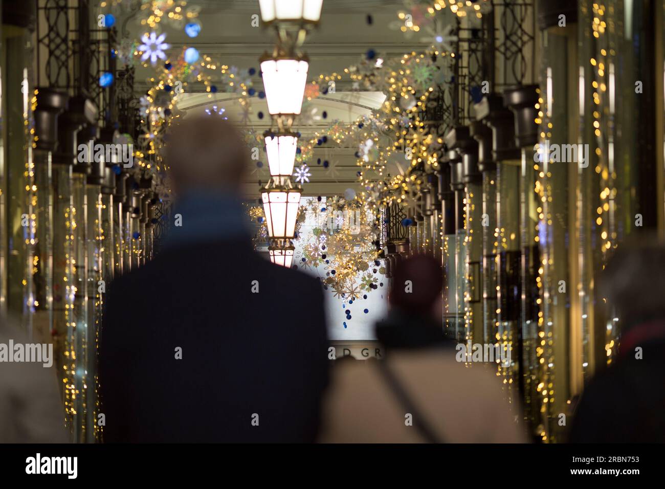 Shoppers walk in central London Stock Photo - Alamy