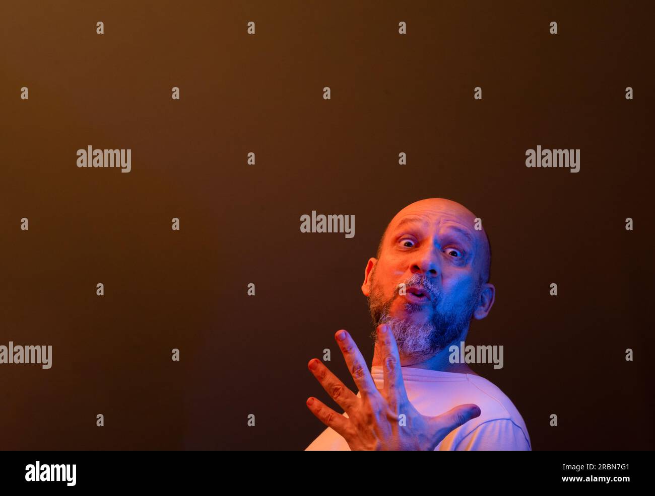 Happy Bald Bearded Man Making Funny Hand Gestures Concept Of Strength