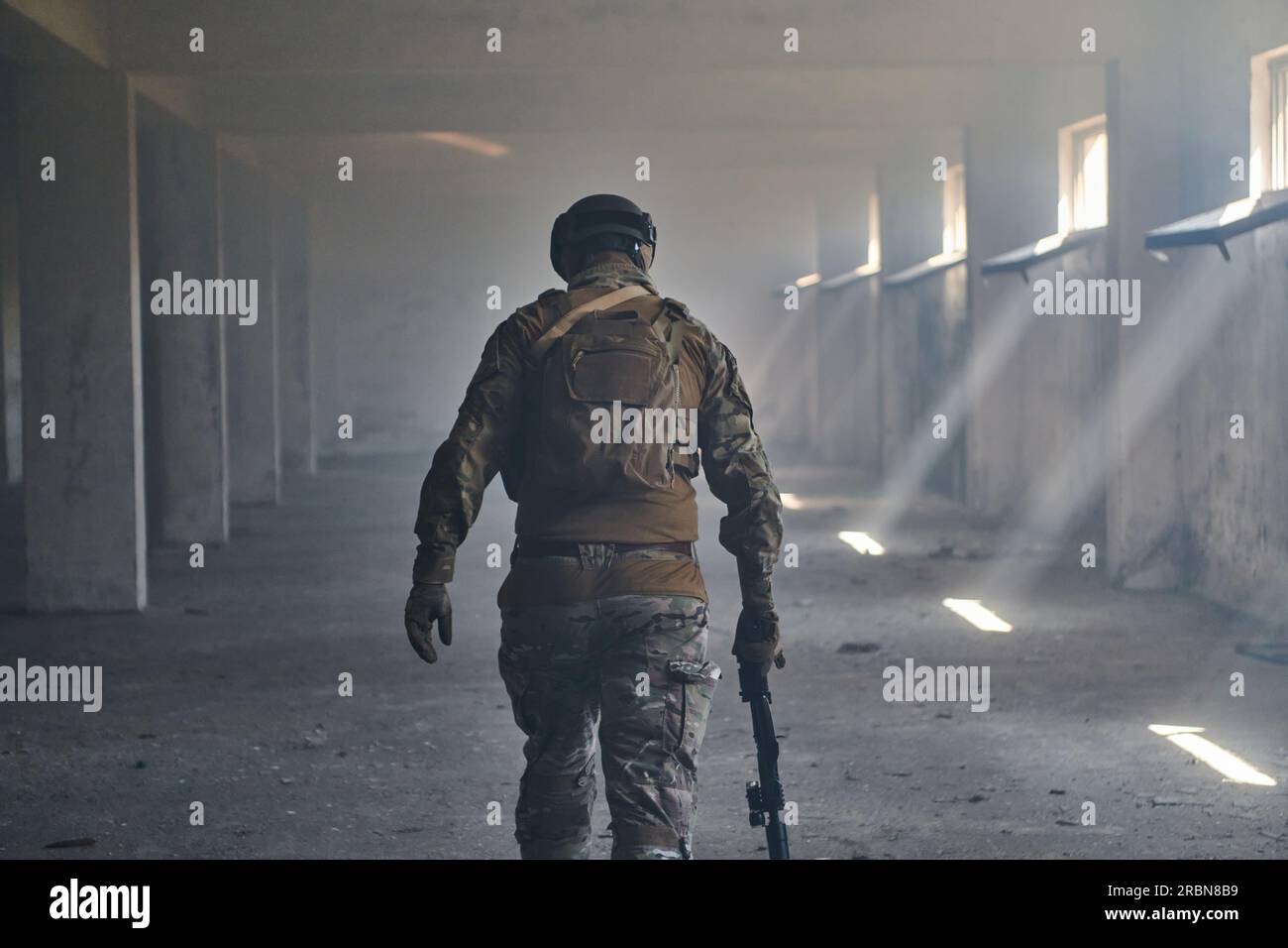 A professional soldier in an abandoned building shows courage and ...