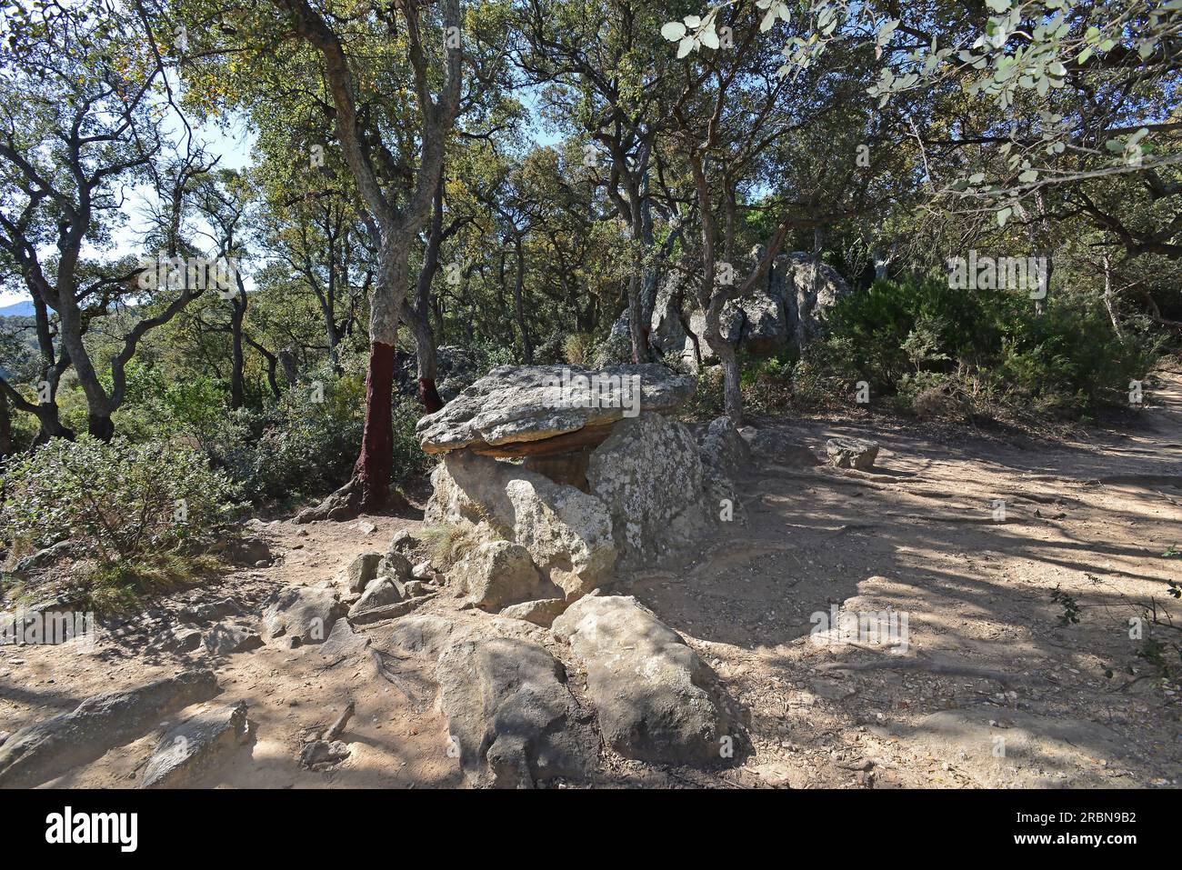 A prehistoric dolmen, made from four vertical wall slabs of stone and a ...