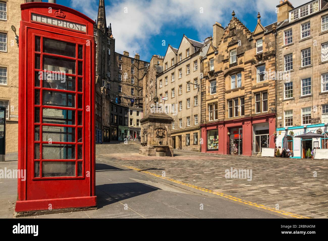 Red telephone box on the corner of Grassmarket and Victoria Street ...